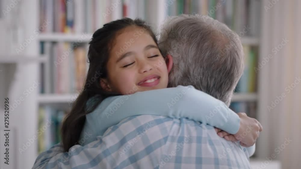 grandfather hugging granddaughter happy little girl embracing grandad ...
