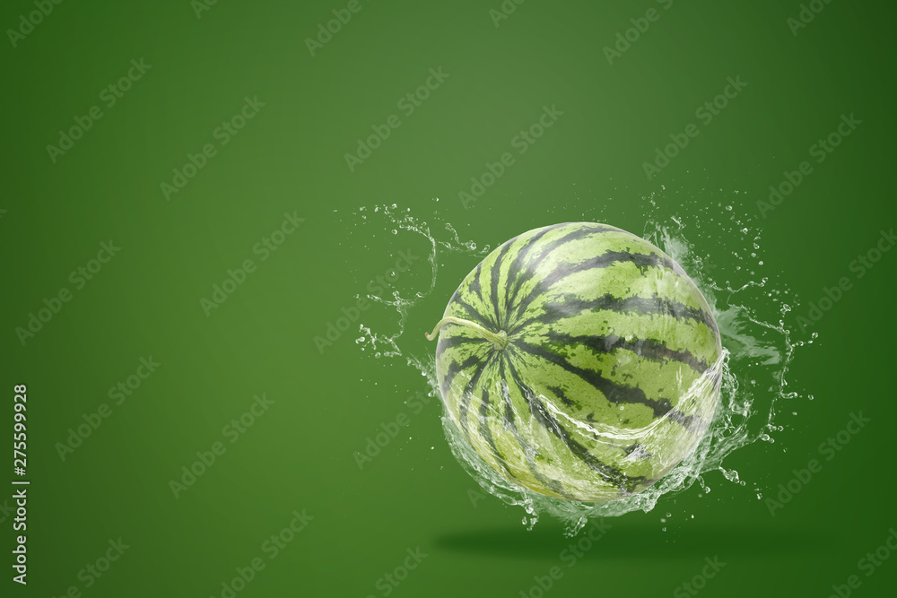 Water splashing on Sliced of watermelon on green background Stock Photo ...