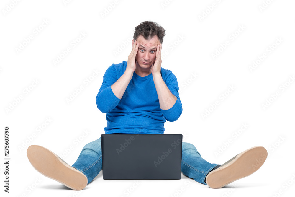 Man Sitting On Ground Depressed