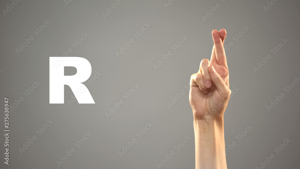 Letter R in sign language, hand on background, communication for deaf ...