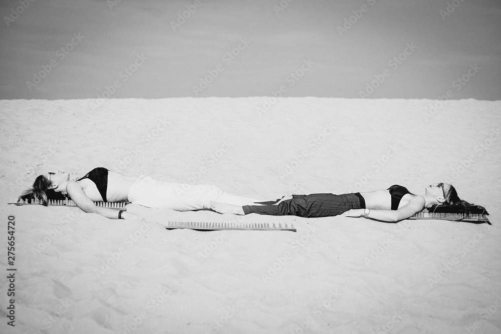 extreme yoga relaxation and self-development - beautiful women laying ...