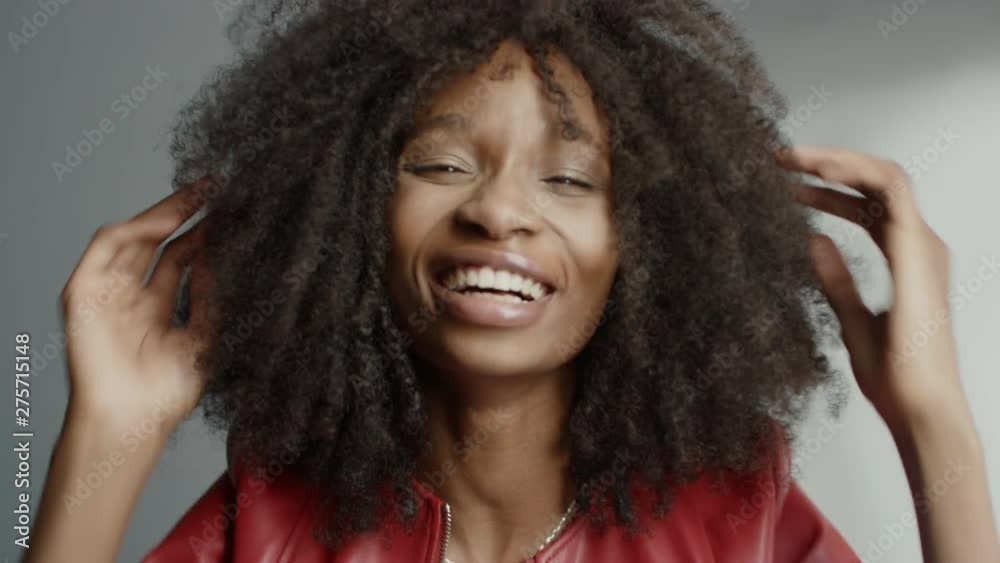 Attractive Black Girl with Lush Curly Hair Posing for a Fashion ...