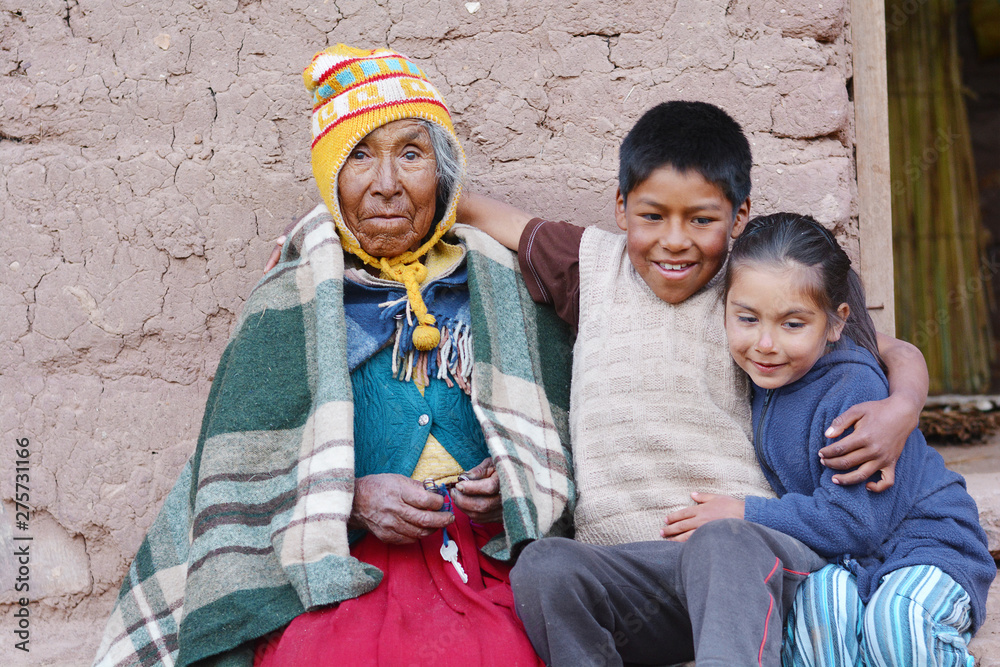Native american old woman with her grandchildren. Stock Photo | Adobe Stock
