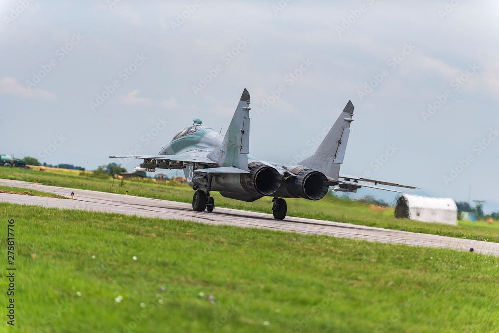 Russian fighter Mikoyan Gurevich MiG 29 heat up engines before flight ...