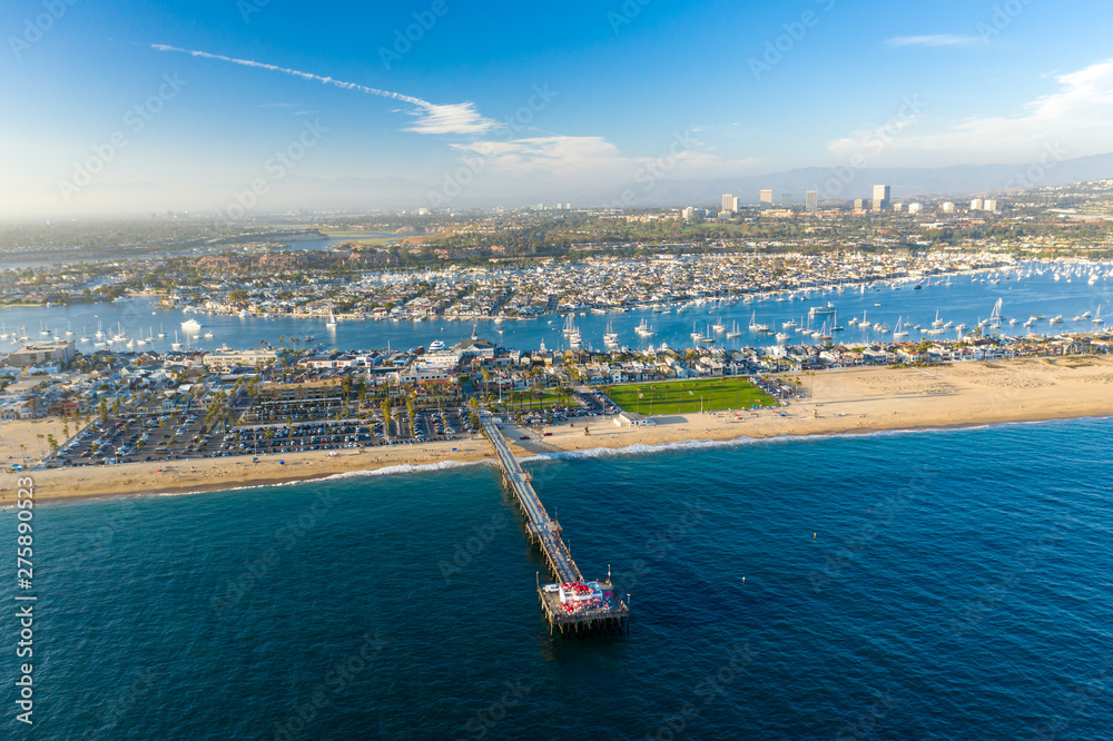 Aerial view from above over Newport Beach in coastal Orange County ...