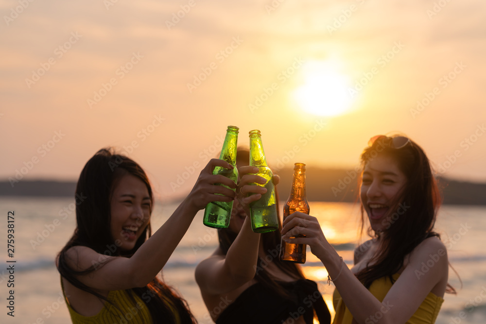 Candid of young attractive three asian girl group of friends cheers ...