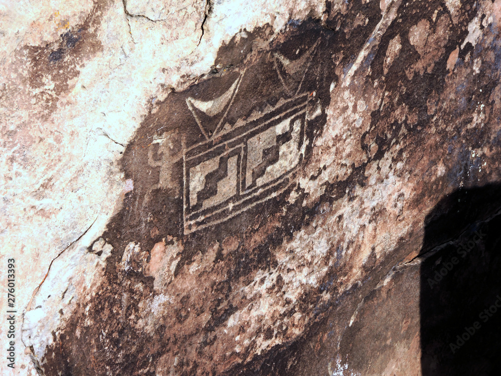 The petro glyphs or etchings on rocks by people who lived in the area ...