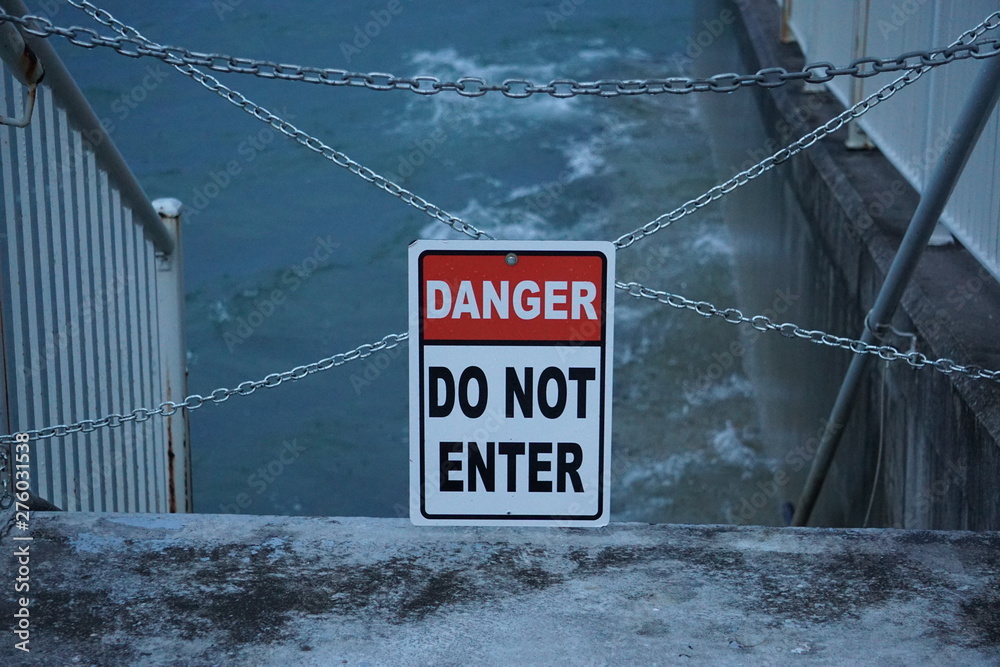 Danger - Do Not Enter Sign at the water's edge on Lake Michigan Stock ...