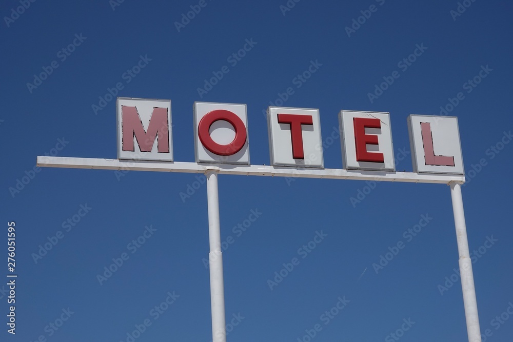 Vintage motel sign with blue Skye background. Stock Photo | Adobe Stock