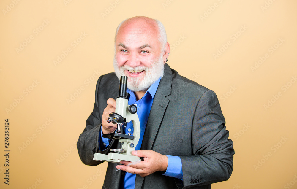 Molecular biology PhD projects. Mature man formal suit with microscope ...