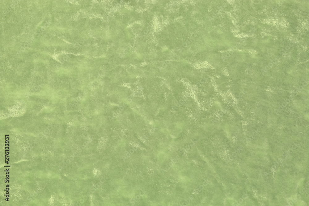 Texture of green velvet fabric. Textile background of gentle color with ...