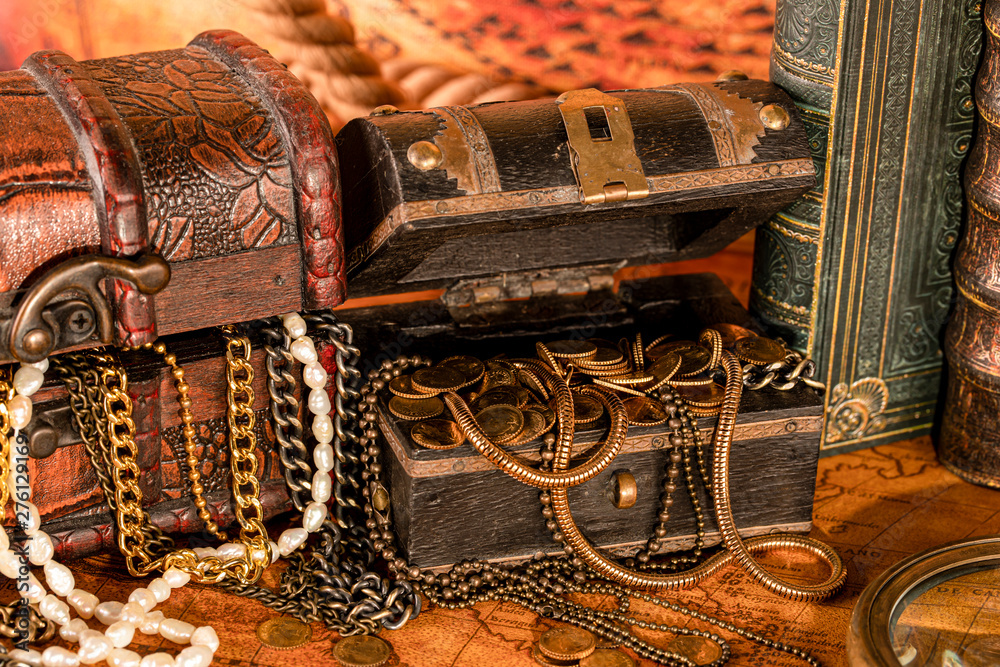 Antique treasure chest with gold and books. Vintage style. 1565 old map ...