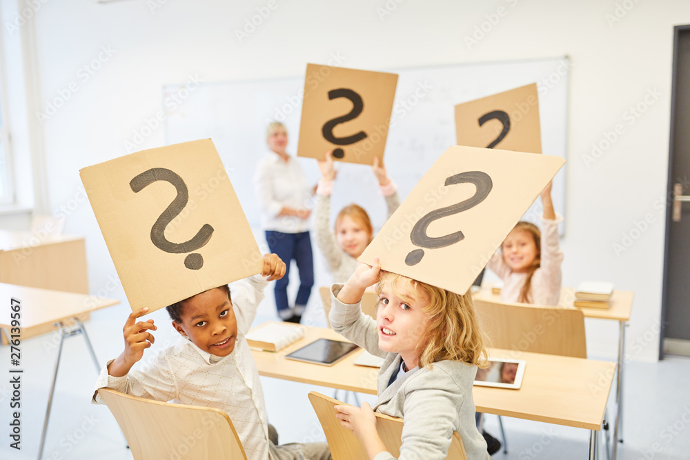 Children in elementary school keep question mark Stock Photo | Adobe Stock
