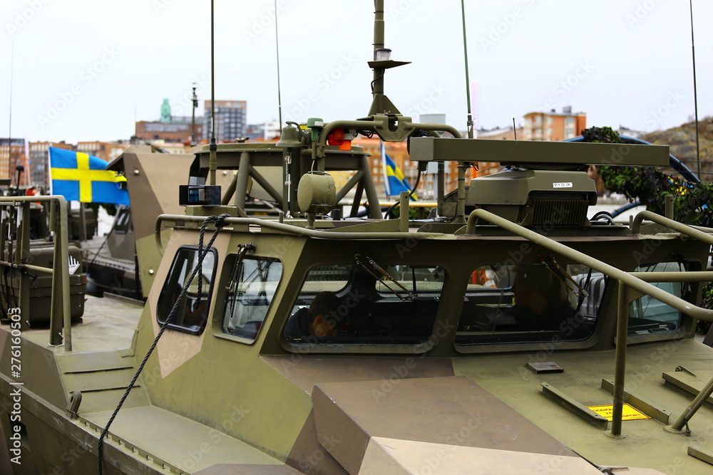 Navy day showing combat boats, automatic guns, UAV, drone, warships ...