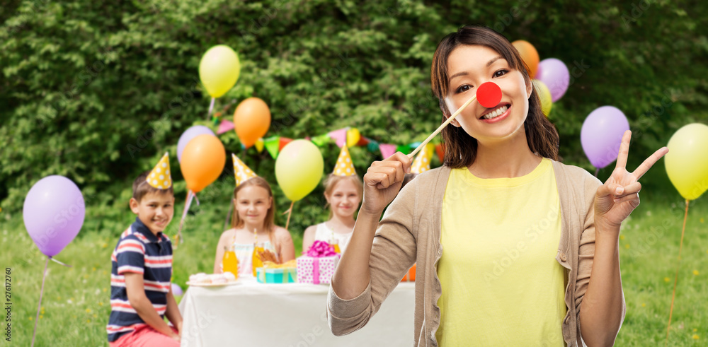fun, entertainment and celebration concept concept - happy asian young ...
