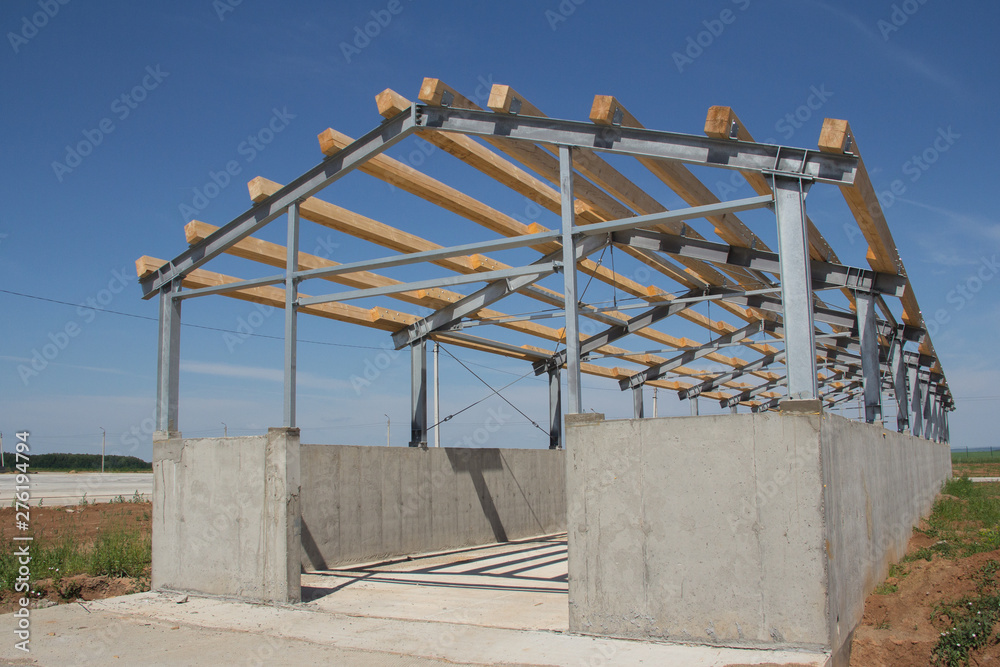 Future village hangar. Agricultural building. Reinforced concrete base ...