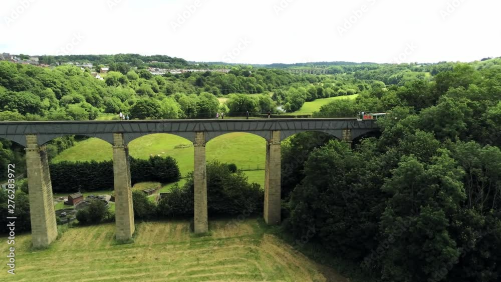 Pontcysyllte Aqueduct arch bridge canal waterway crossing. Aerial dolly ...