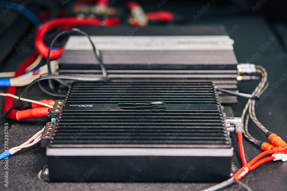 installation of the amplifier and speaker system in the car Stock Photo ...