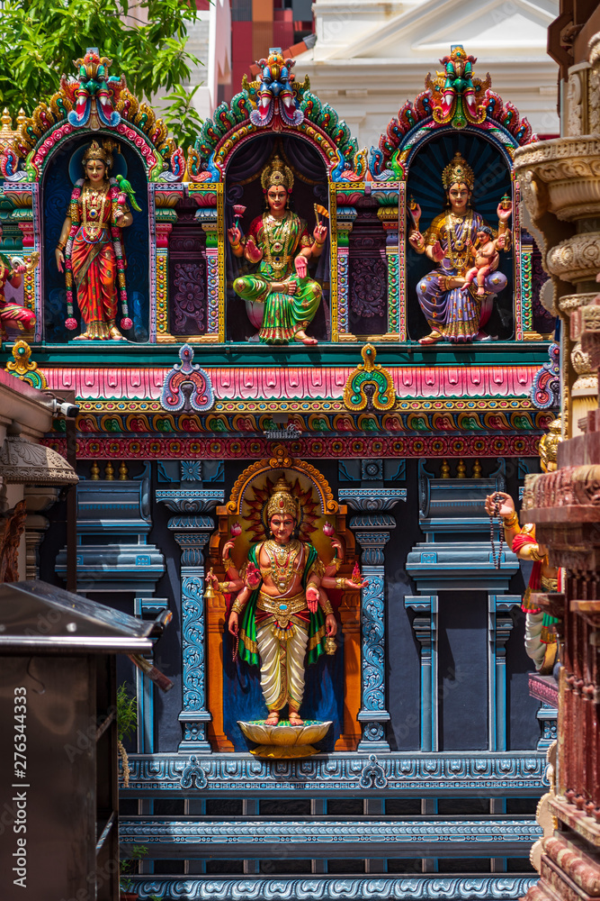 Colourful statues of Hindu religious deities in sri krishnan temple in ...