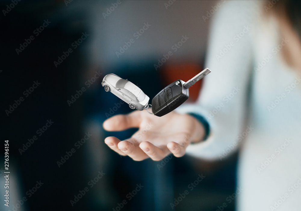 Car keys in hand Stock Photo | Adobe Stock