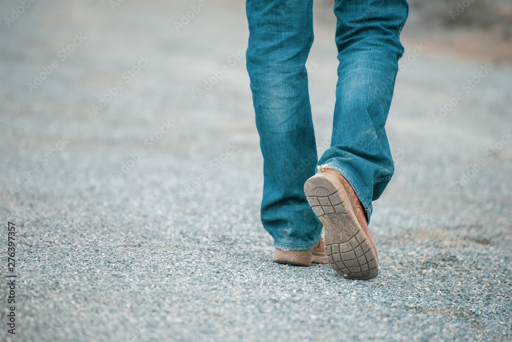Feet walking of lonely man,step by step on the street.Picture of ...