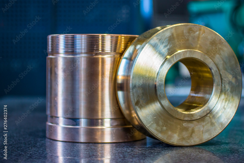 Bronze billet for cutting teeth and threaded sleeve. Stock Photo ...