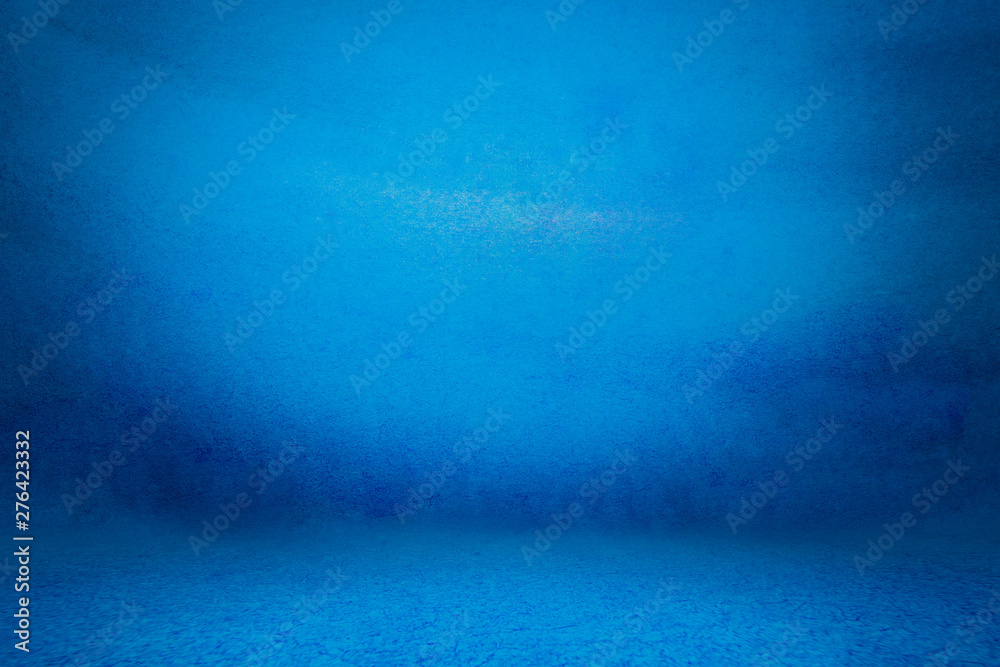 blue photo backdrop wall and floor lit by lamps, studio background for ...
