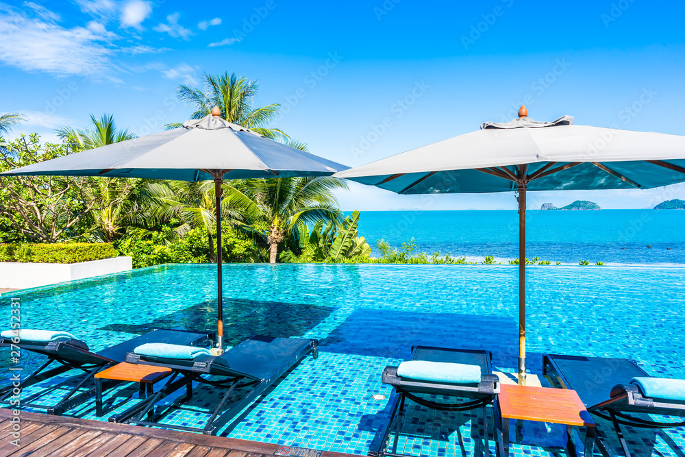 Beautiful luxury outdoor swimming pool in hotel resort with sea ocean ...