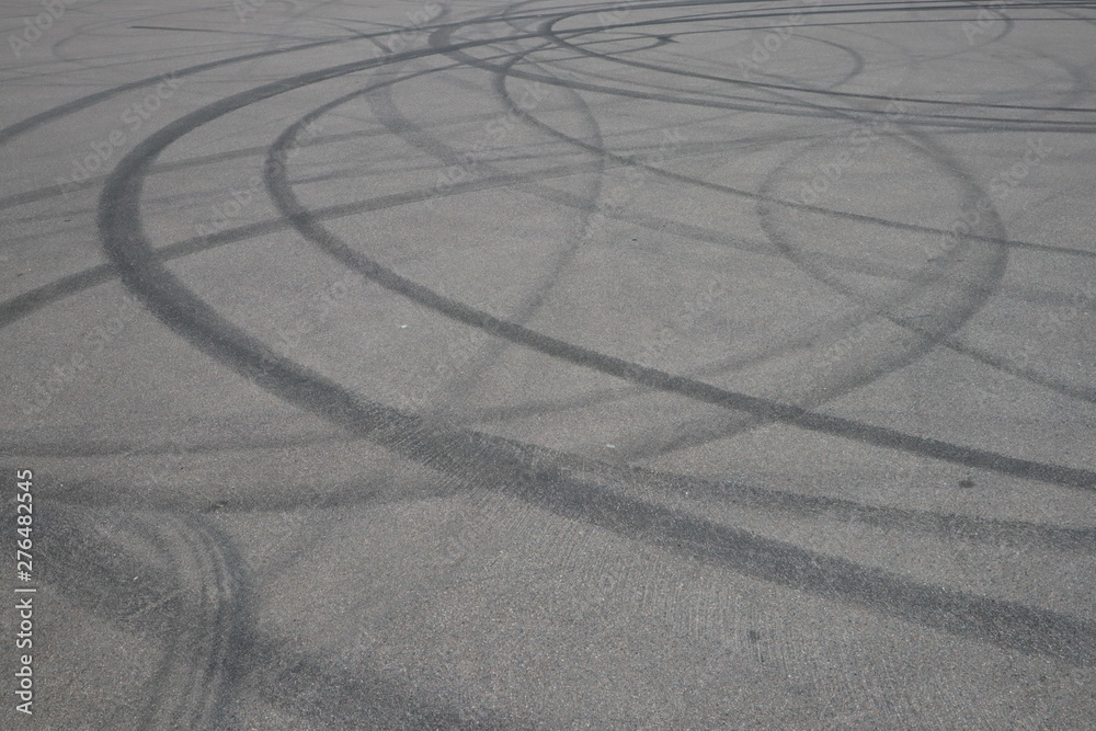 tire tracks. wheel track on asphalt road. asphalt with traces of car ...