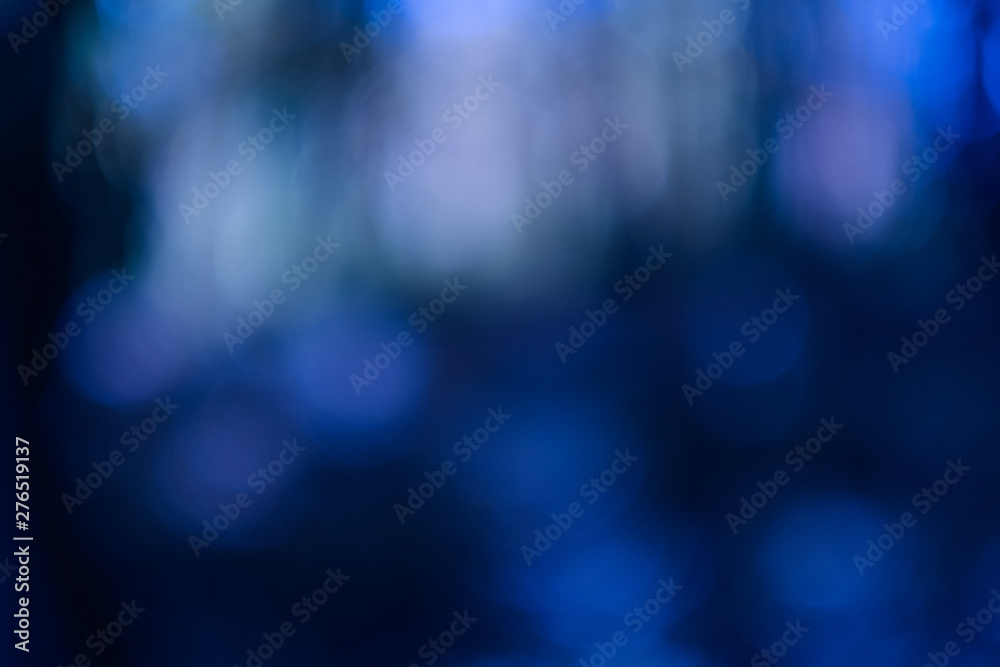 Navy blue bokeh lights. Defocused lens flare effect. Dark abstract art ...