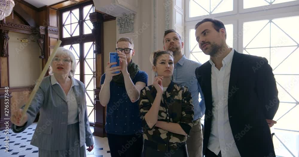 Group of people having museum guide tour Stock Video | Adobe Stock