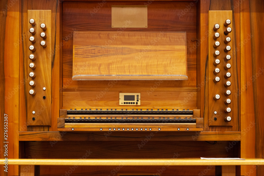 Pipe organ seat with keyboard, timbres and music stand. Stock Photo ...