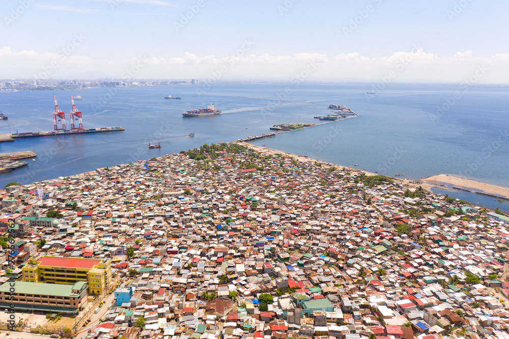 Port in Manila, Philippines. Sea port with cargo cranes. Cityscape with ...