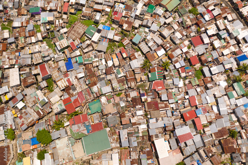 Streets of poor areas in Manila. The roofs of houses and the life of ...