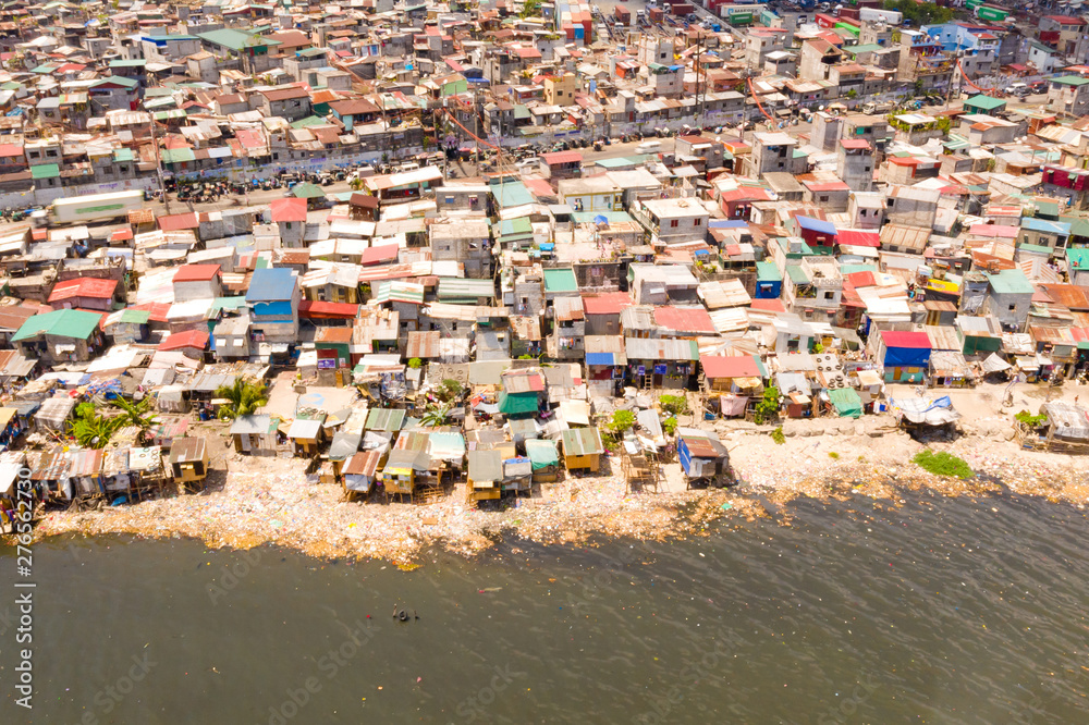 Slums in Manila, a top view. Sea pollution by household waste. Plastic ...
