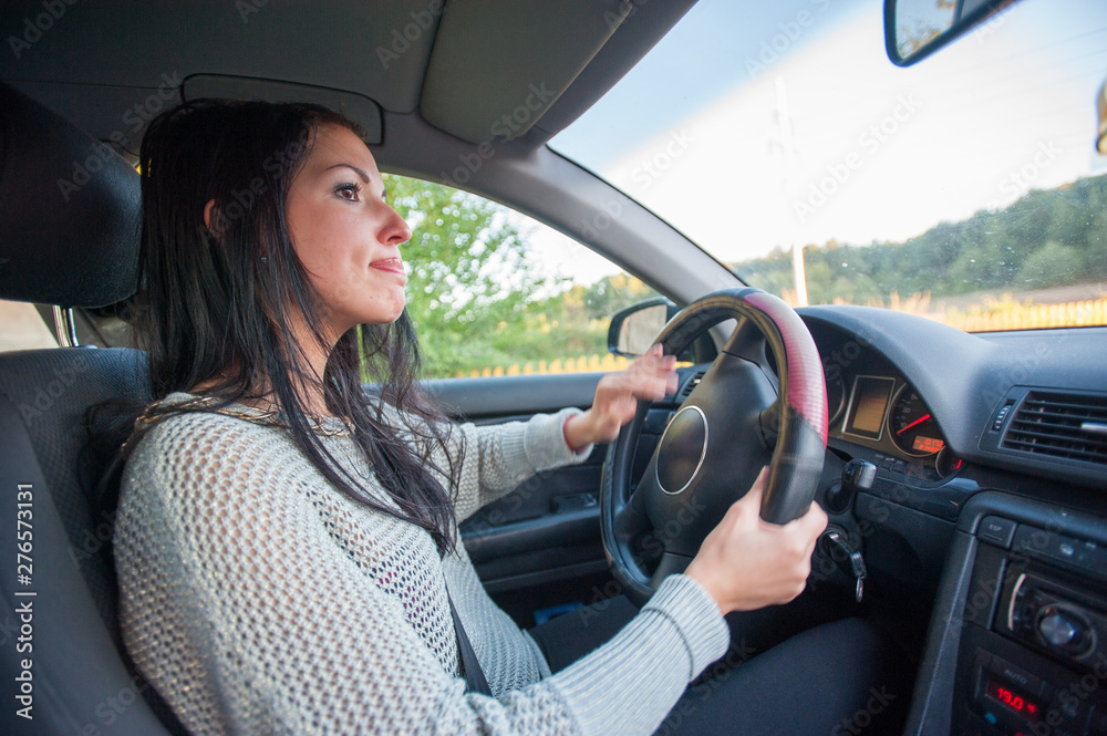 The girl drives the car carefully. Be careful when turning. pulled out ...