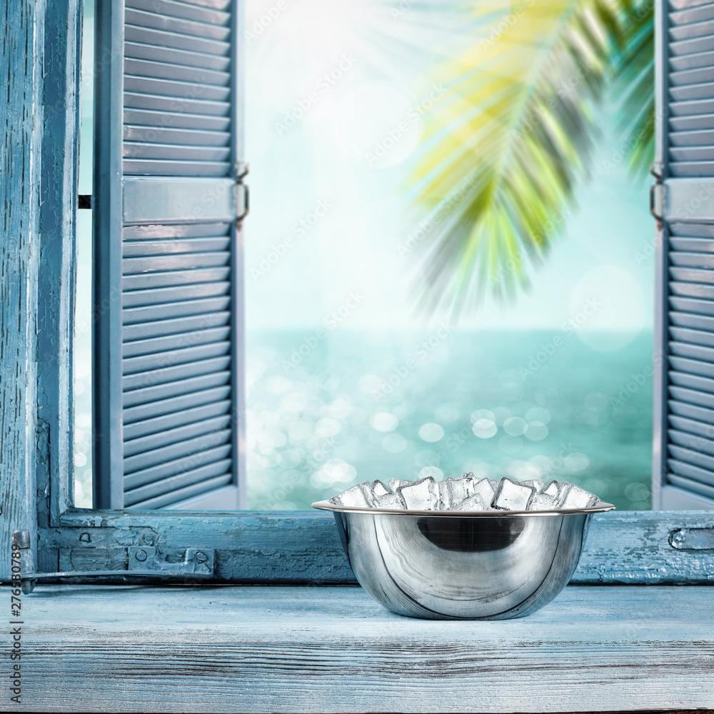 Cold ice in metal container with free space for your product or bottle ...