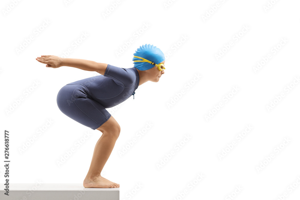 Boy in a wetsuit getting ready to jump for a swim 스톡 사진 | Adobe Stock