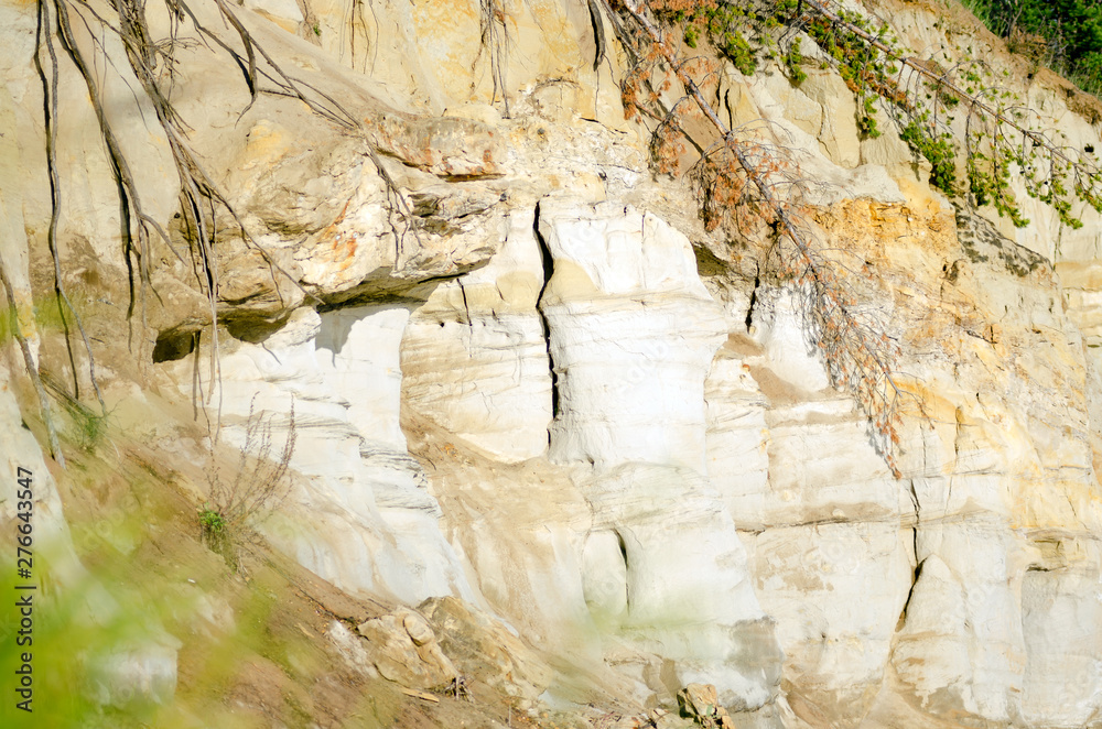 The clay cliff by the river with eroziunii types of terrain and ...