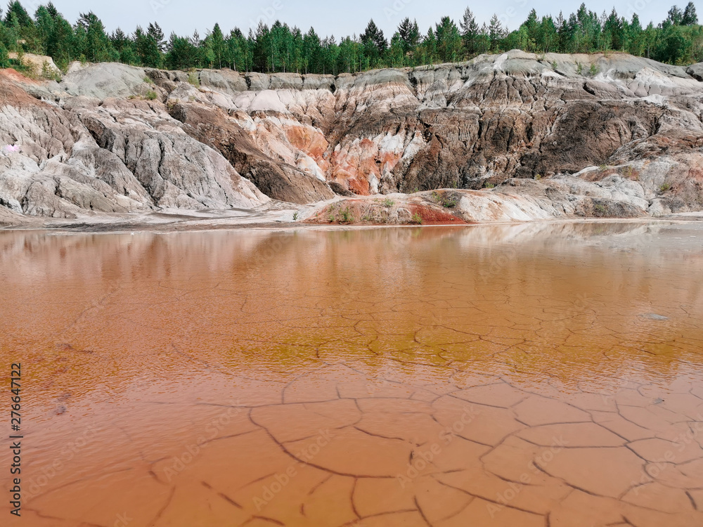 Clay Open Quarry Mars Landscape with red Water. stone Texture. Erosion ...