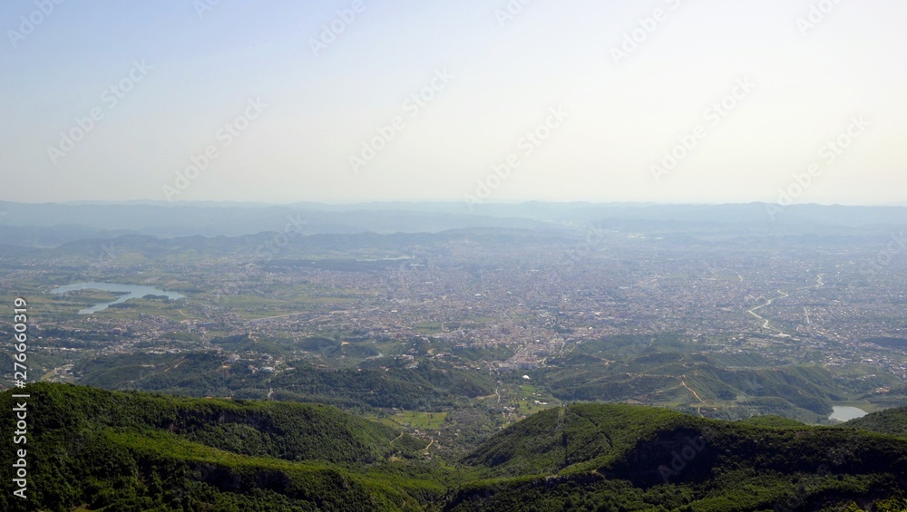 Foggy aerial view of Tirana, Albania. Tirana city seen from the Dajti ...