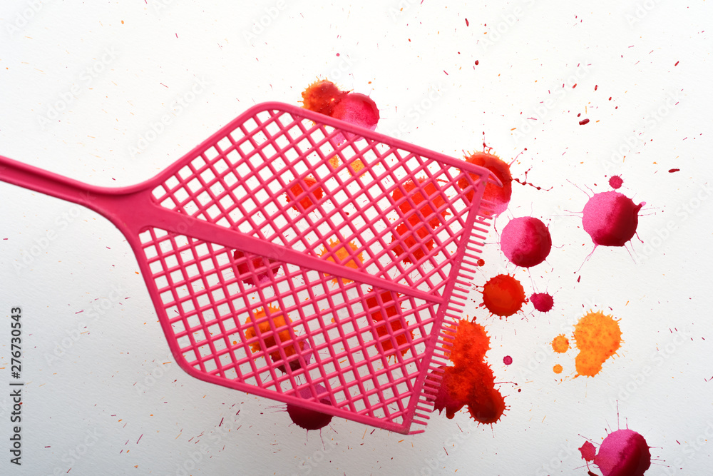 Fly swatter with splashes of fake blood from swatted flies and insects ...