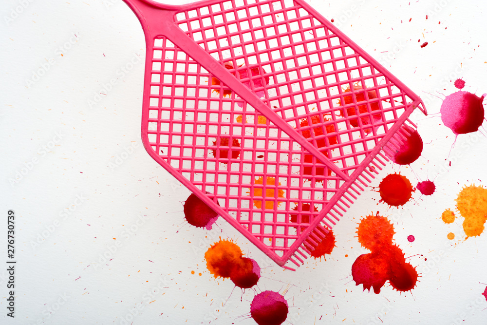 Fly swatter with splashes of fake blood from swatted flies and insects ...