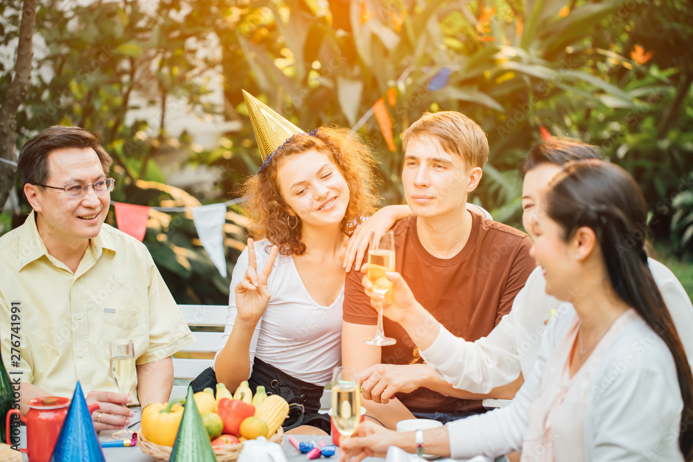 Family and Friends Gathered Together at the Table.Cooking bbq outdoor ...