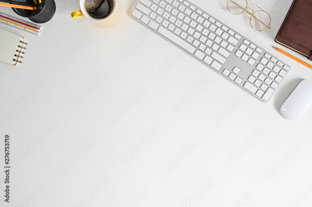 Office desk top view table with computer keyboard, coffee, notebook on ...