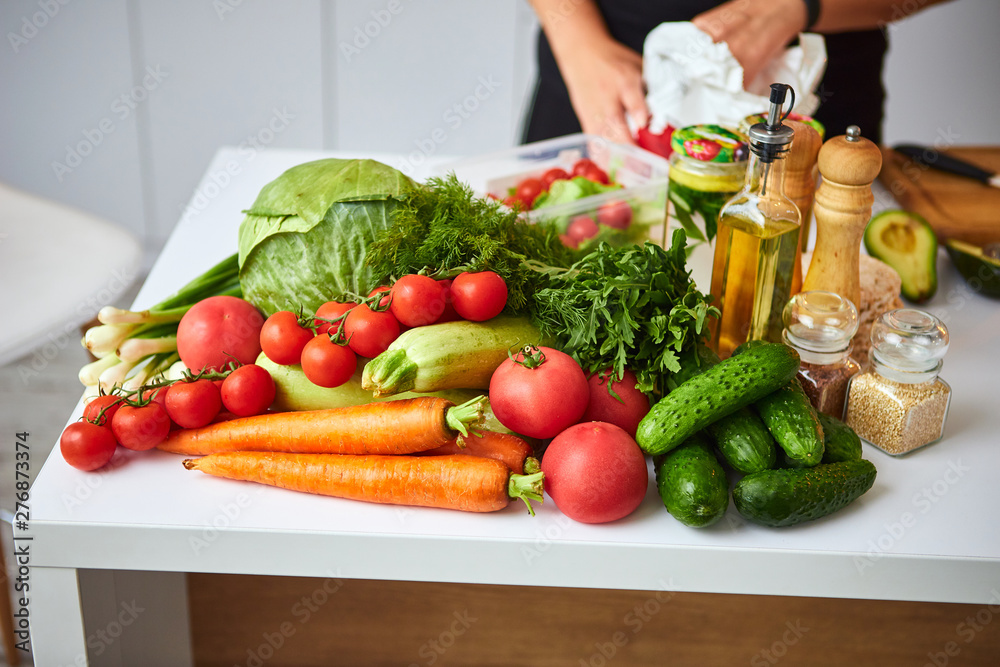Raw organic vegetables, fruits and nuts with fresh ingredients for ...