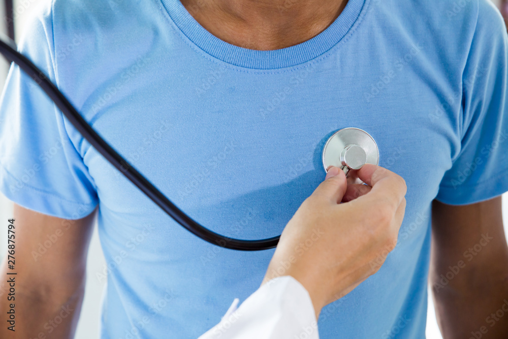 Medical concept.Doctor is checking on patient's chest uses stethoscope ...