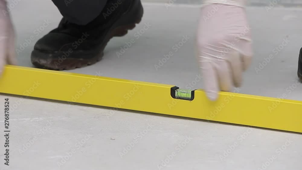 Measuring floor level Stock Video | Adobe Stock