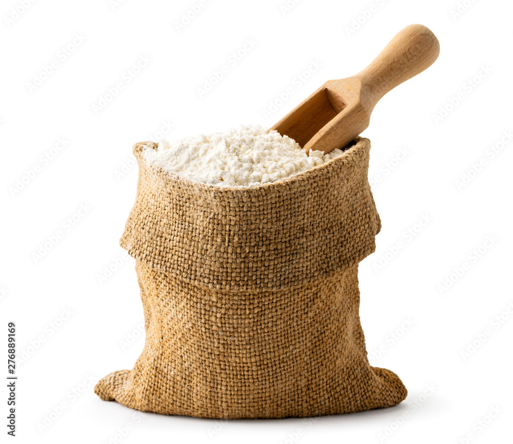 Flour in a bag with a wooden scoop on a white, isolated. Stock Photo ...
