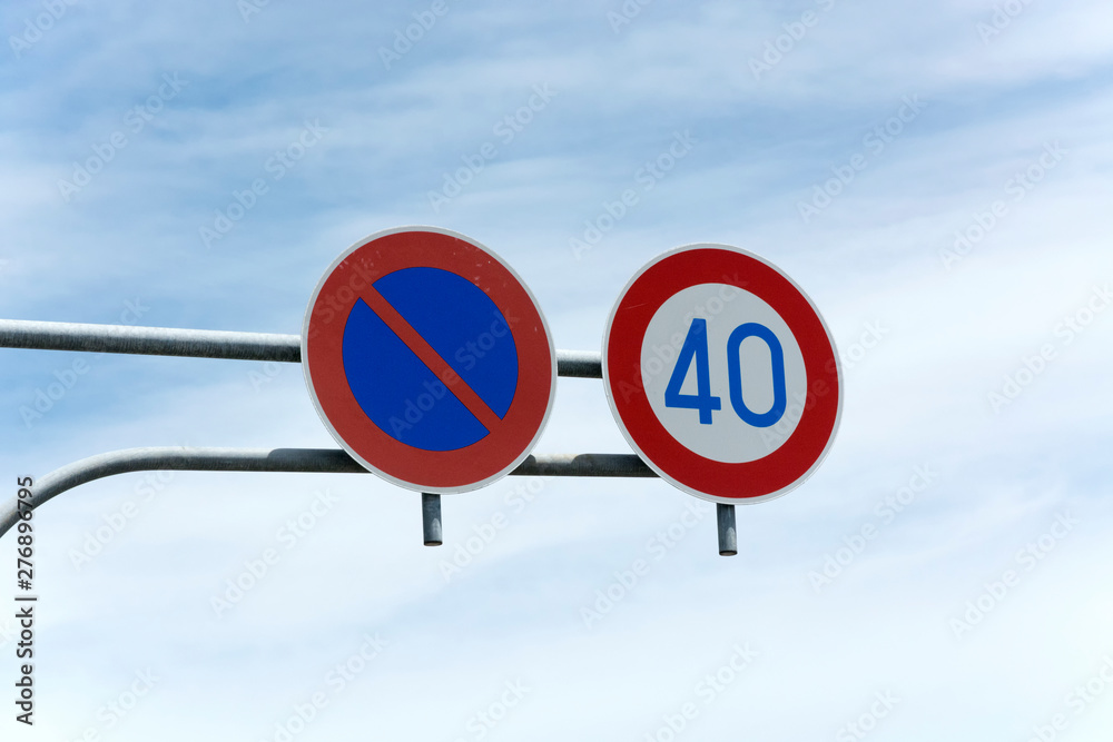 View on two round traffic signs above the road to enhance the road ...